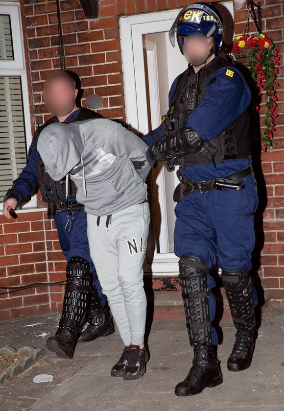 Eight arrests as police swoop in dawn raids across East Manchester ...