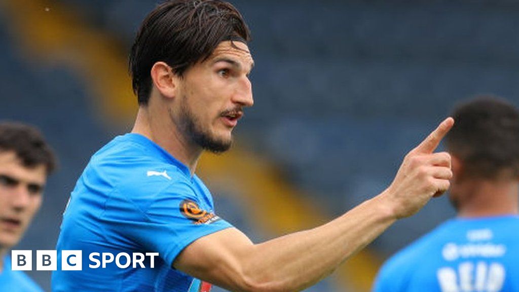 Defender Ash Palmer has agreed a new one-year deal with Stockport ...